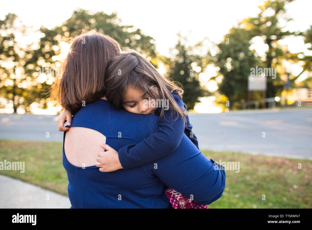 Mother Carrying Daughter