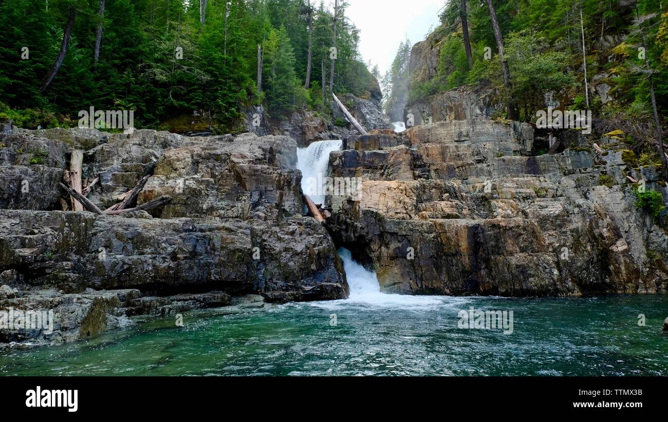 water find its way through the stone Stock Photo - Alamy