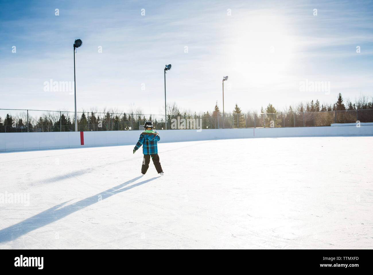 Boy ice skating hi-res stock photography and images - Alamy