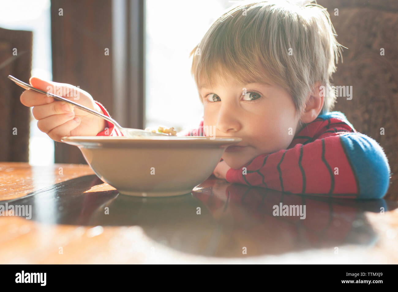 Leaning on table hi-res stock photography and images - Alamy