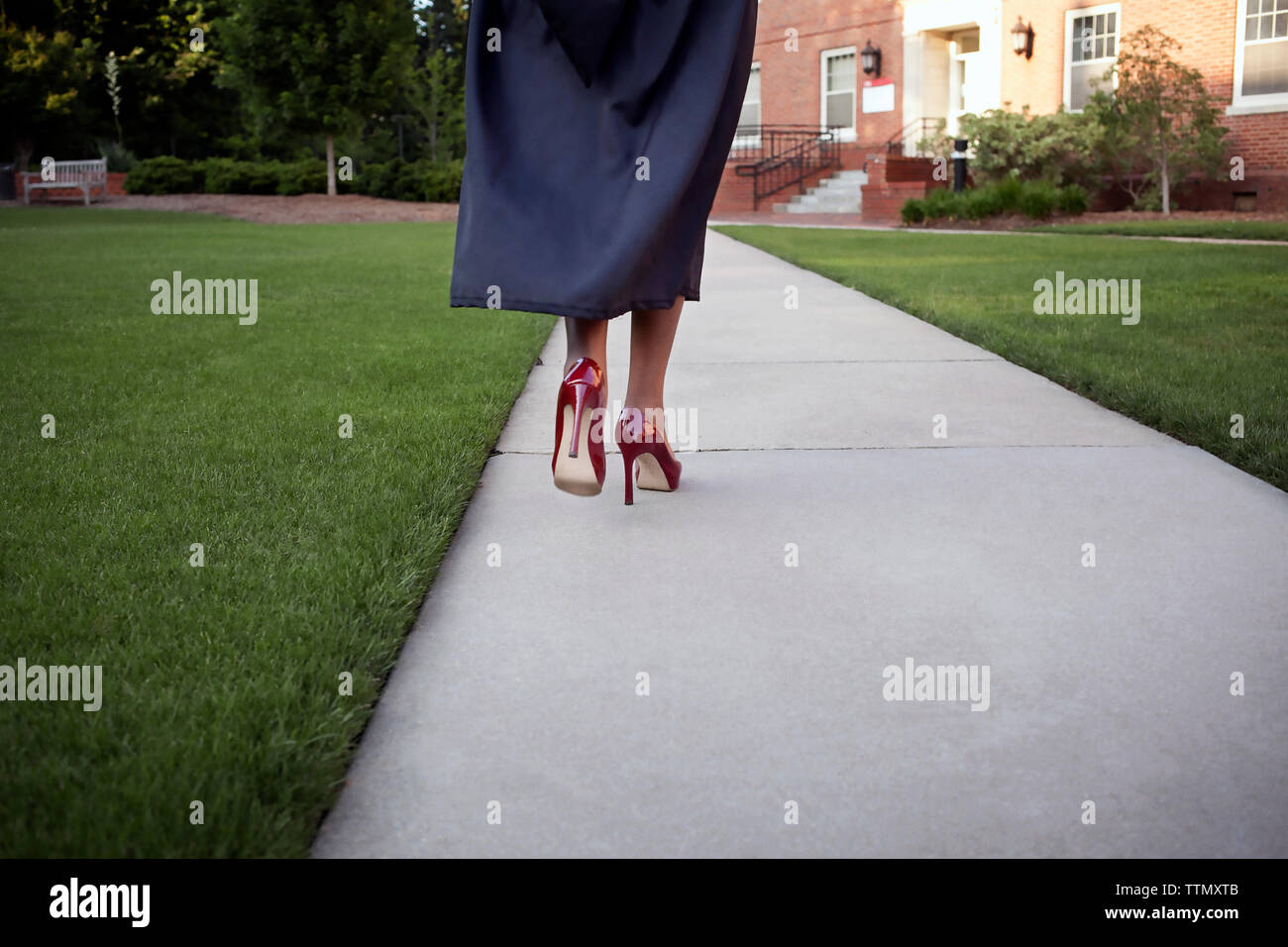 Woman on heels walking in hi-res stock photography and images - Alamy