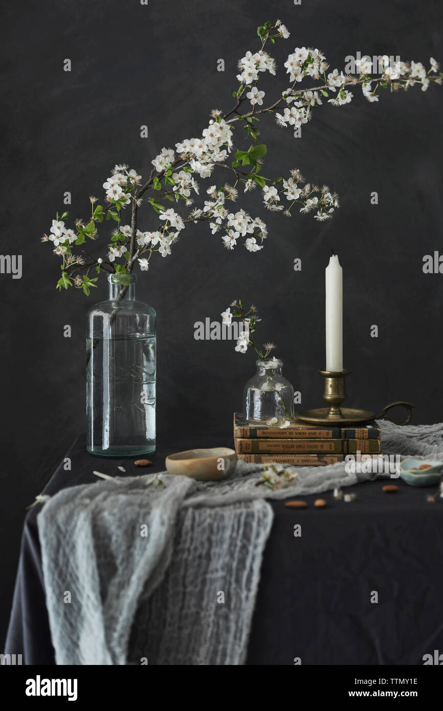 still life white flowers on a table Stock Photo - Alamy