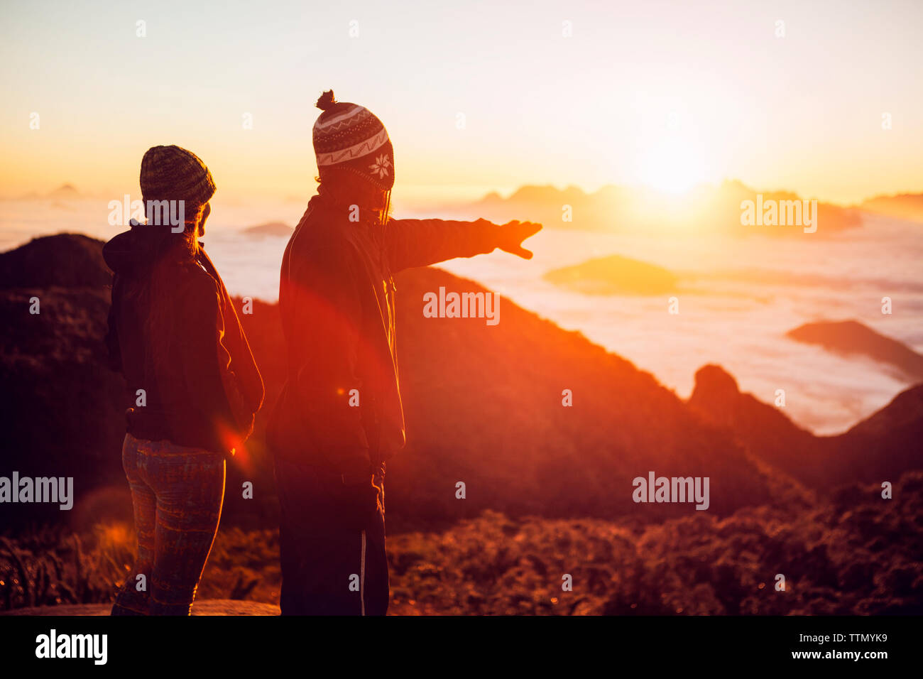 Woman pointing at sky hi-res stock photography and images - Alamy