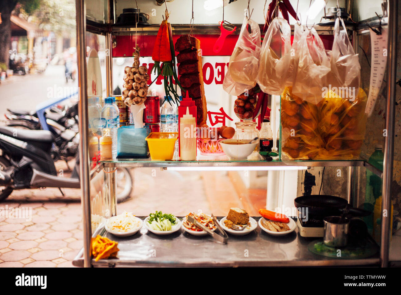 Food stall on footpath at market Stock Photo - Alamy