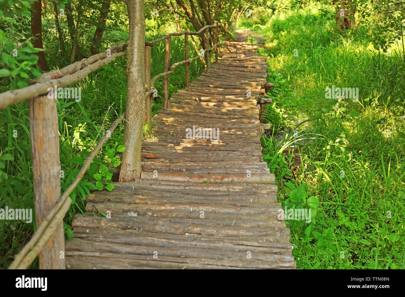 Rustic wooden bridge Stock Photo - Alamy