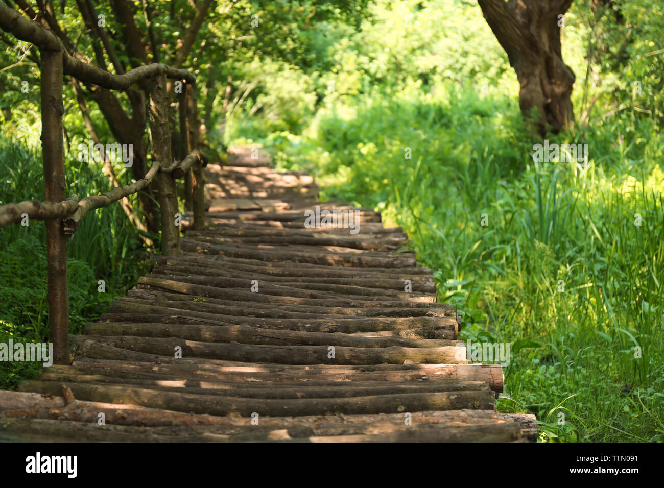 Rustic wooden bridge Stock Photo - Alamy