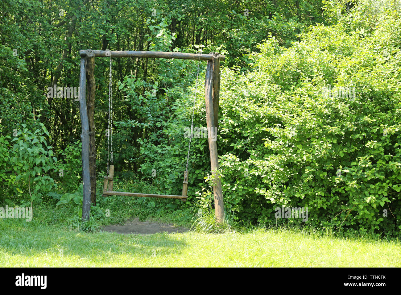 Old wooden swing hi-res stock photography and images - Alamy