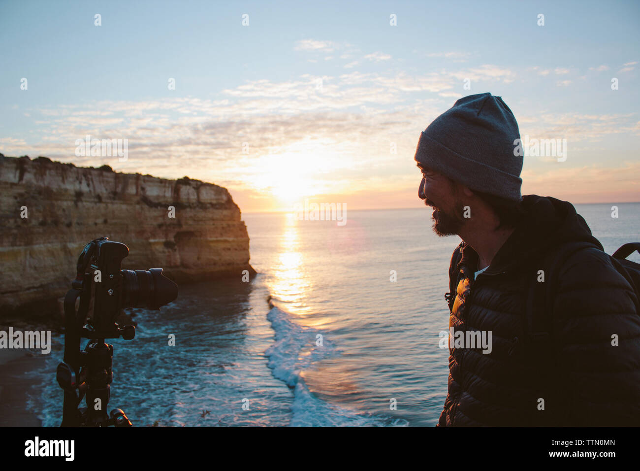 Old man standing at sunset hi-res stock photography and images - Alamy
