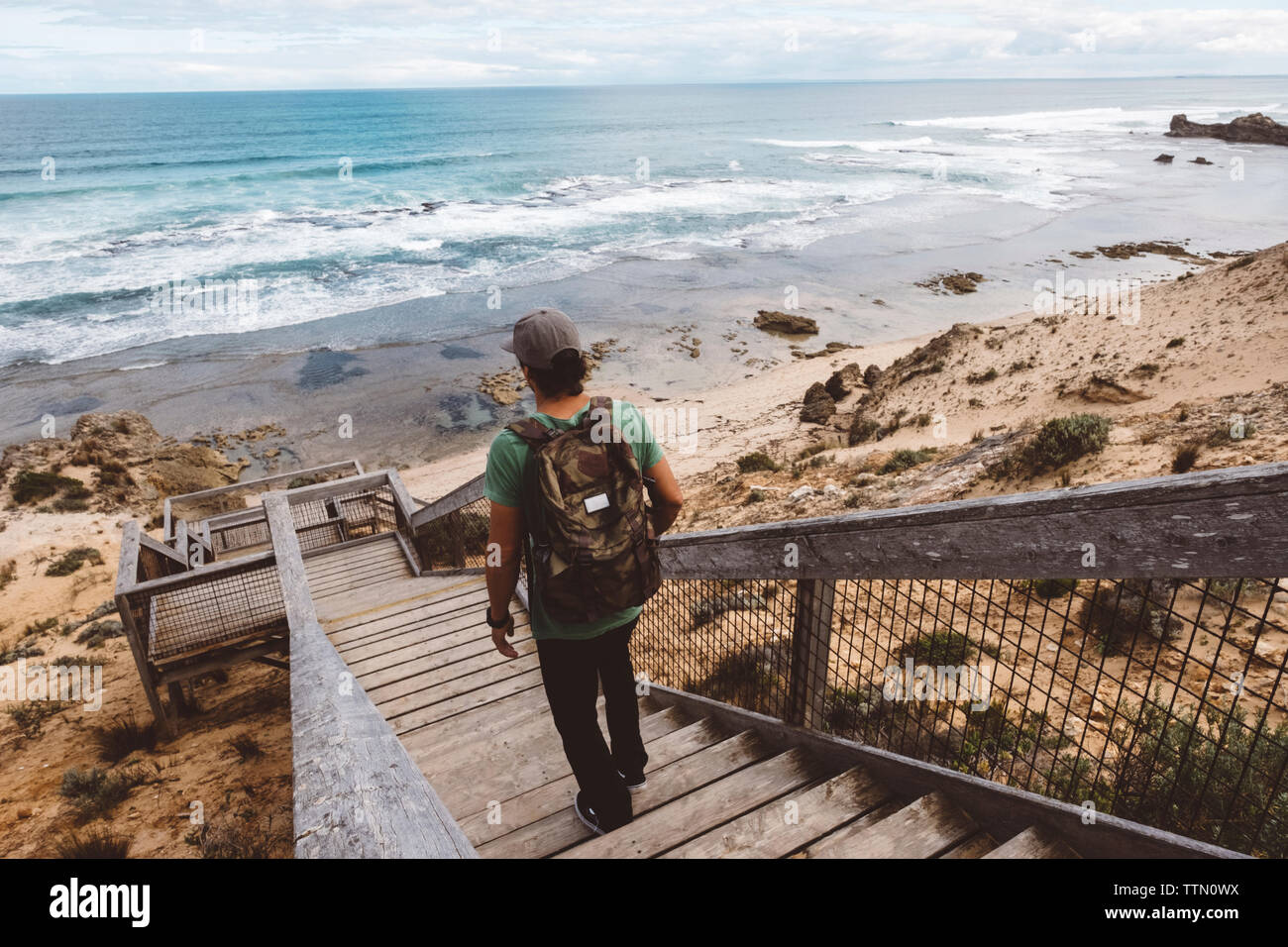 Man walking down steps rear view hi-res stock photography and images ...