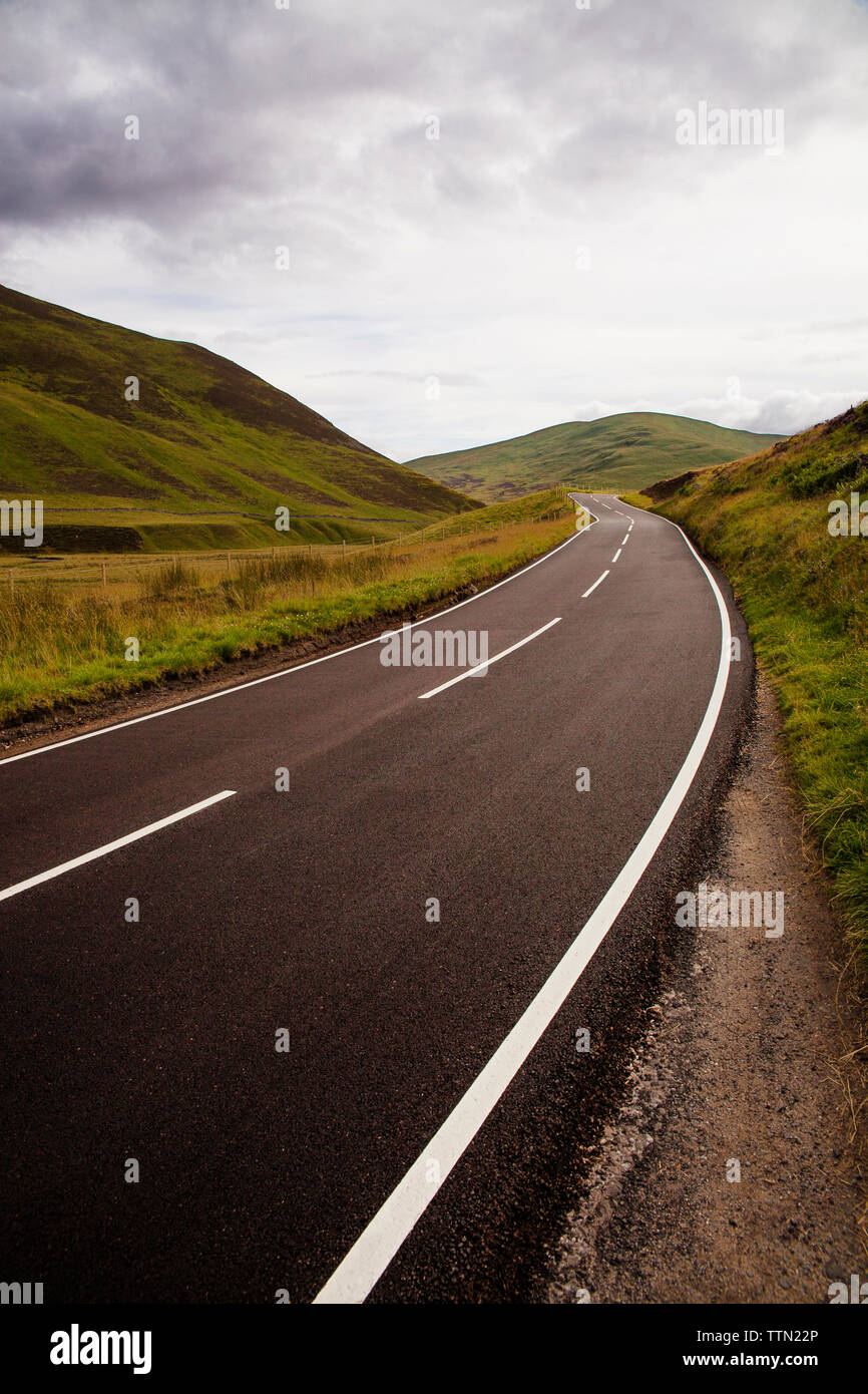 Empty road and rolling landscape Stock Photo - Alamy