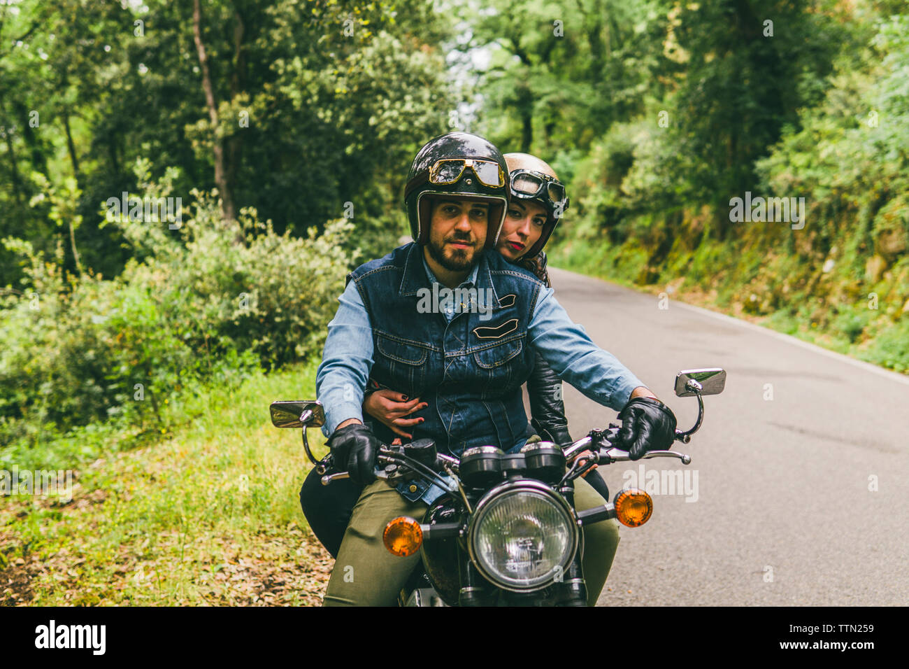 Couple riding motorcycle hi-res stock photography and images - Alamy
