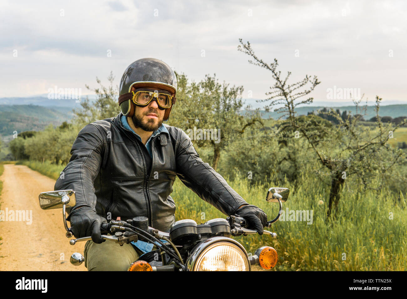 Man riding motorcycle hi-res stock photography and images - Alamy