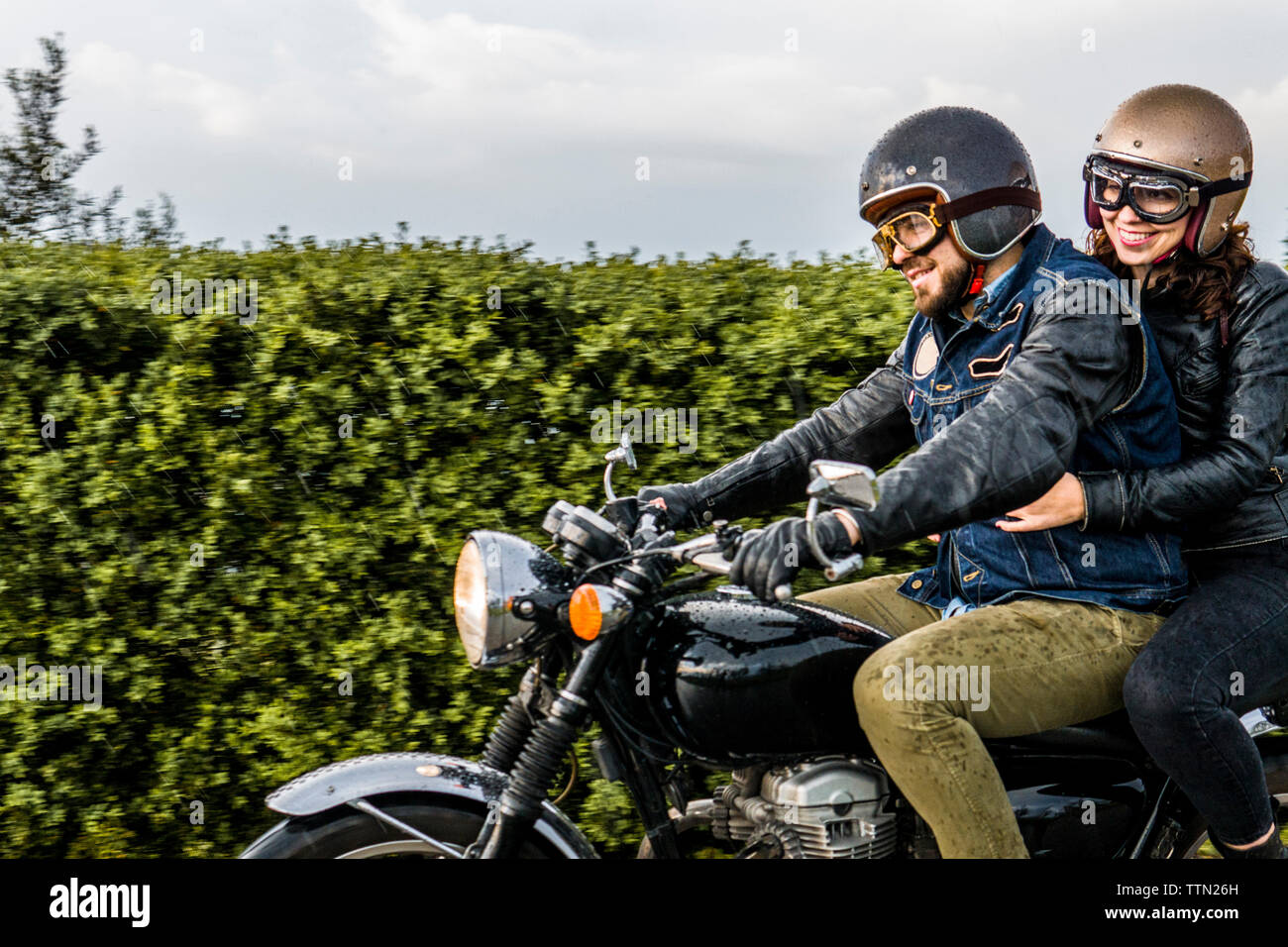Couple riding motorcycle hi-res stock photography and images - Alamy