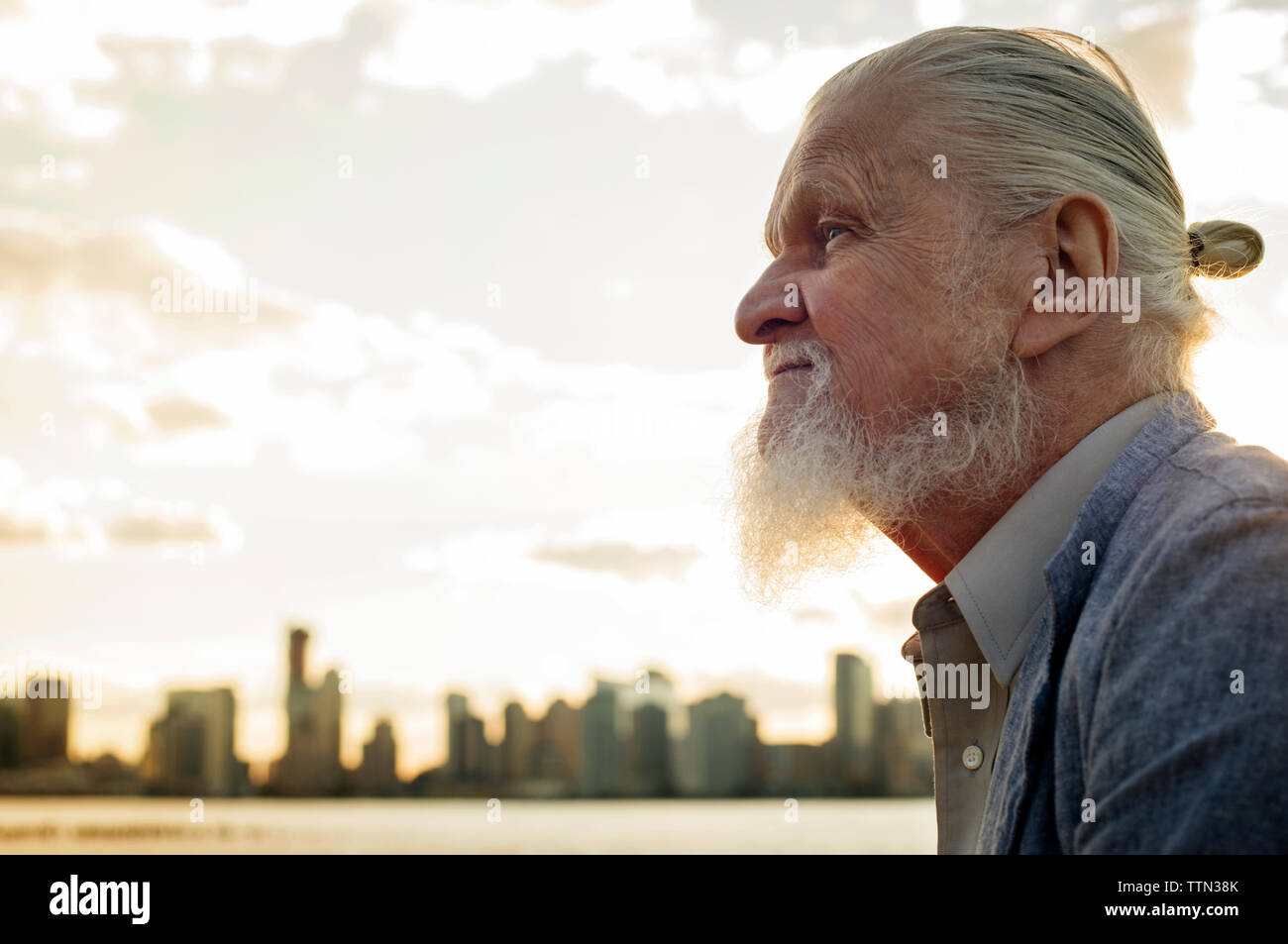 Old man side profile white background hi-res stock photography and ...
