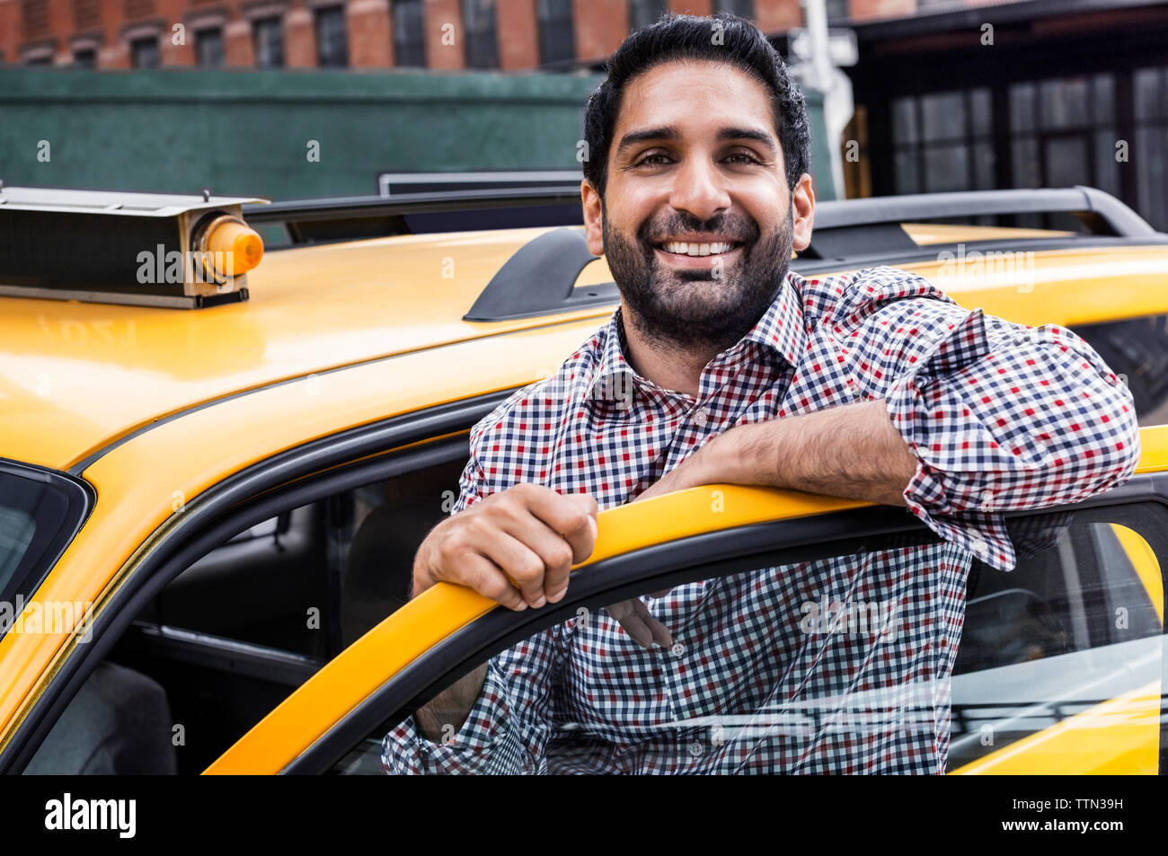 Portrait of taxi driver Stock Photo - Alamy