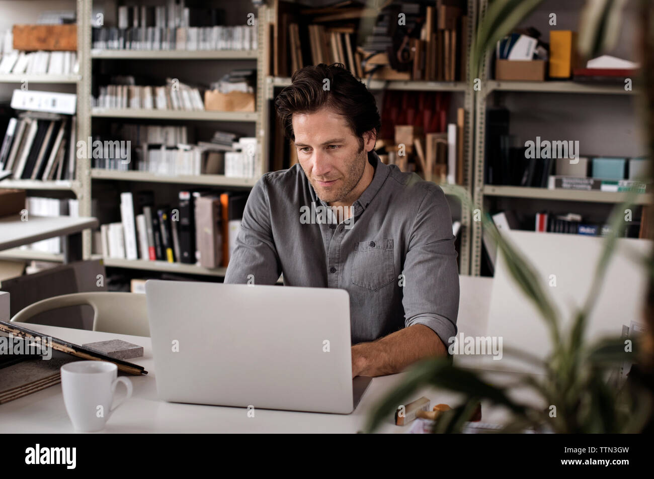 Caucasian male creative using hi-res stock photography and images - Alamy