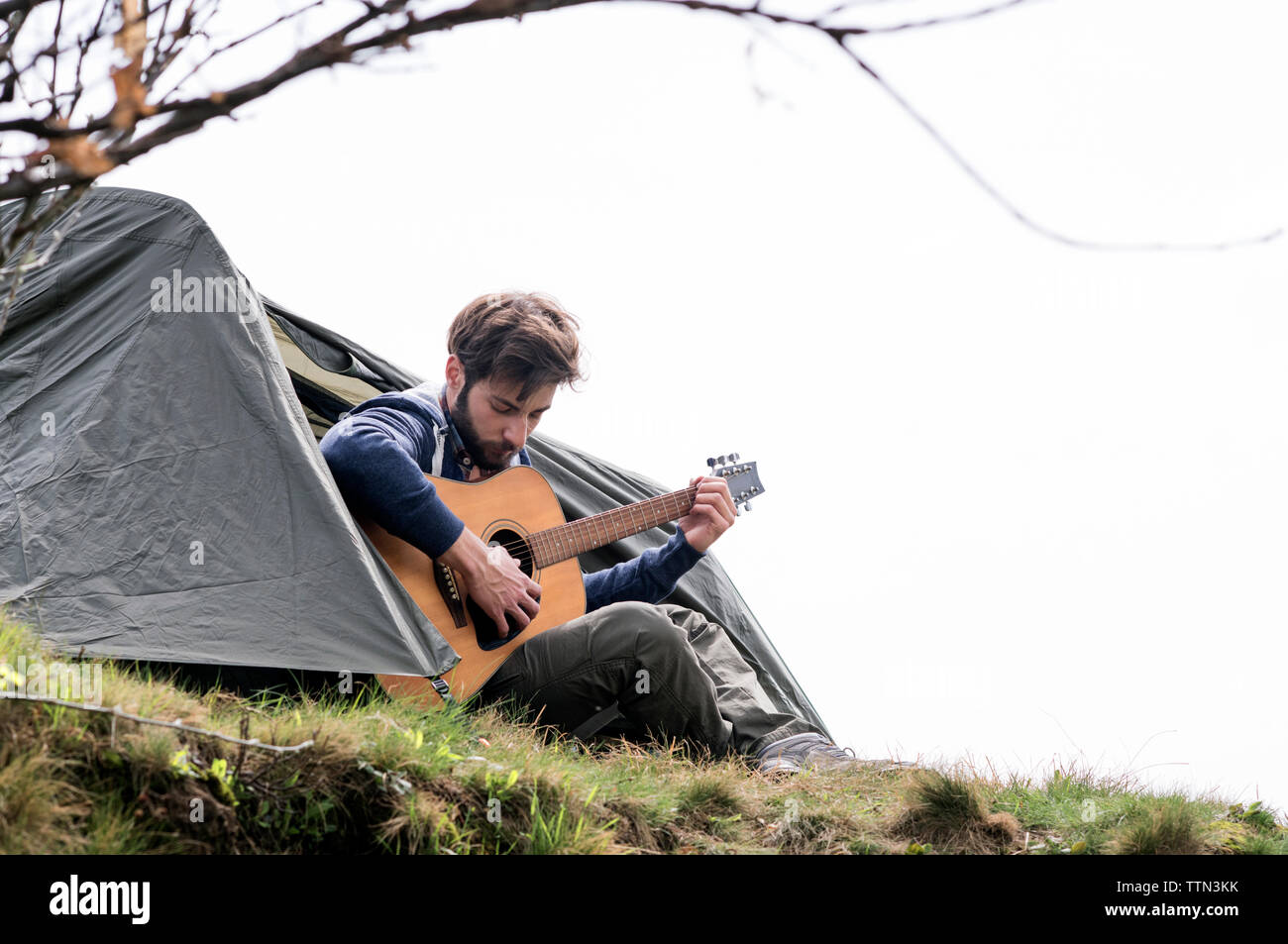 From playing guitar hi-res stock photography and images - Alamy
