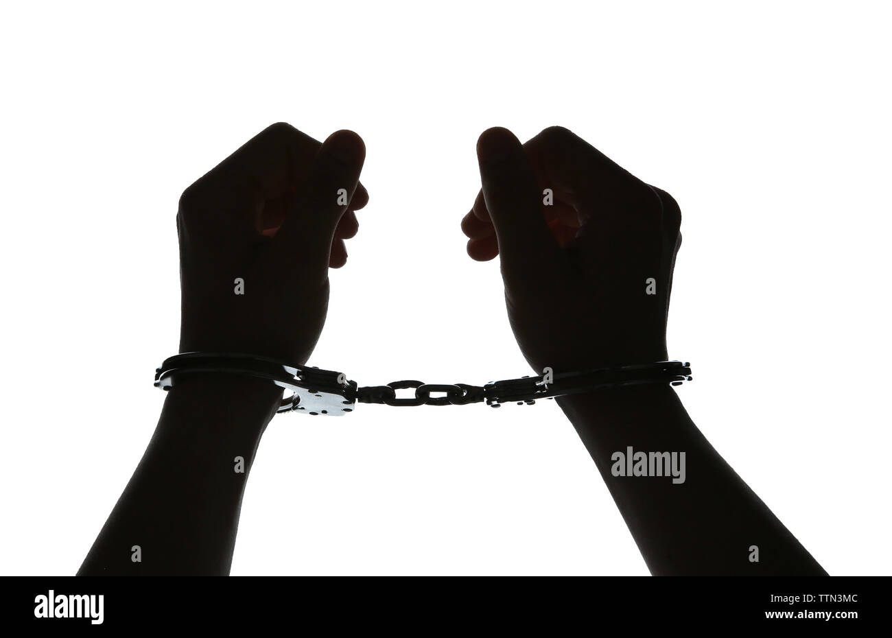 Man in jail silhouette handcuffs Cut Out Stock Images & Pictures - Alamy