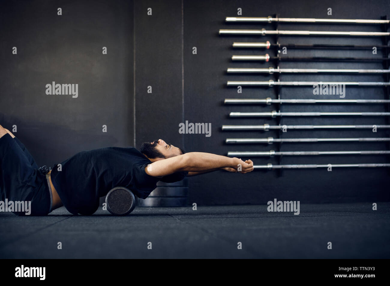 Man in gym side view hi-res stock photography and images - Alamy