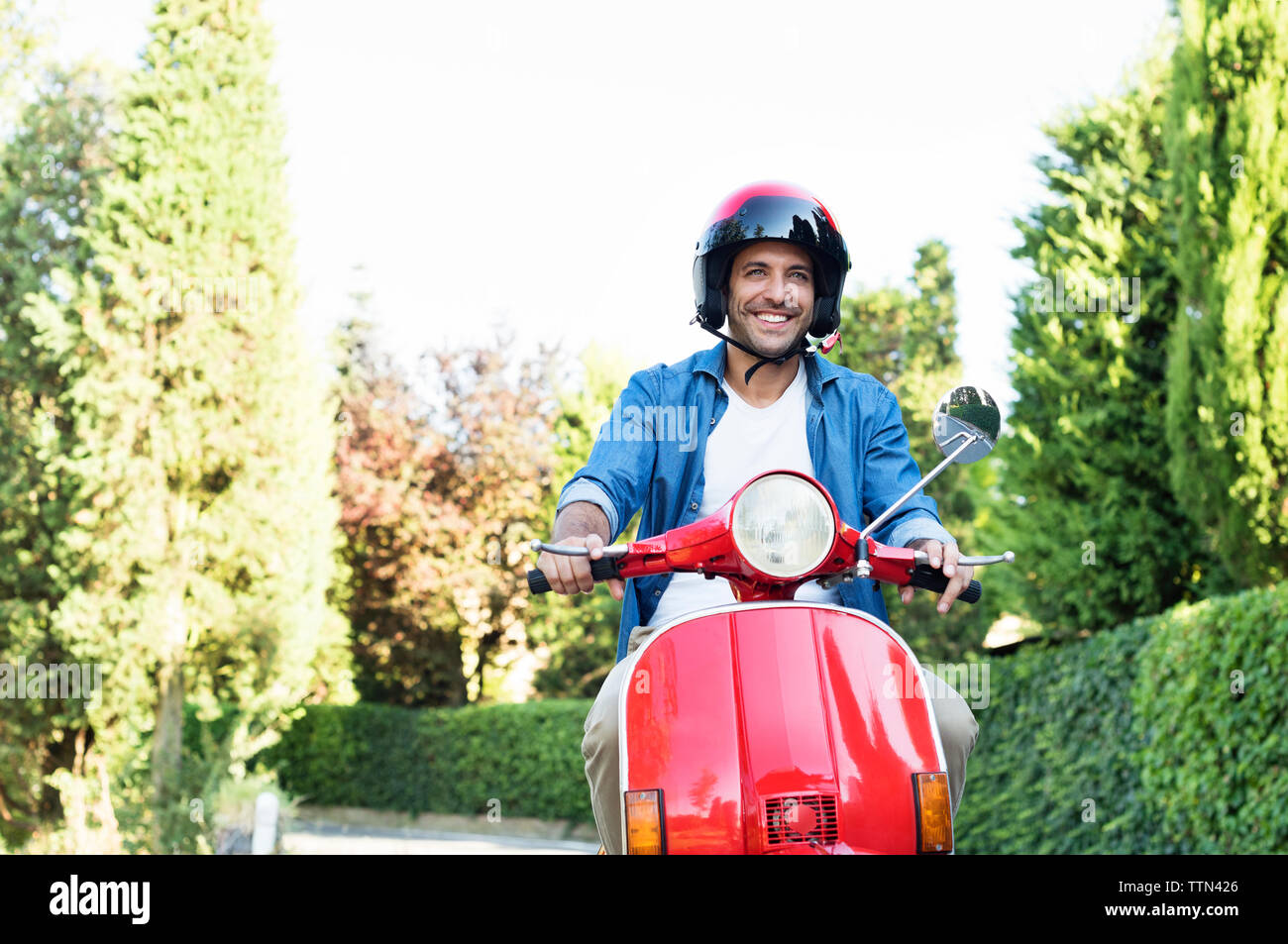 Motor scooter and helmet hi-res stock photography and images - Alamy