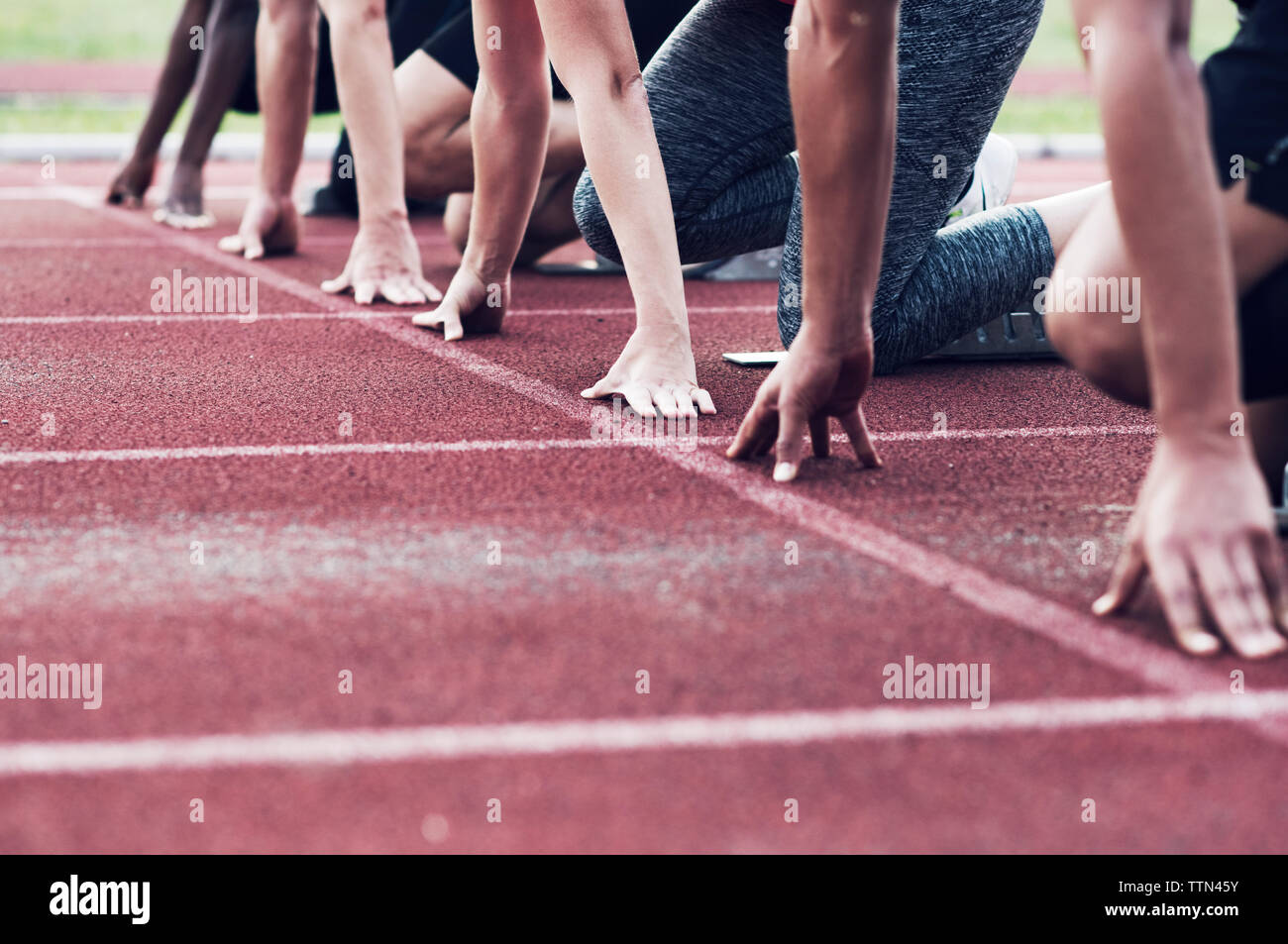 Athletes starting blocks hi-res stock photography and images - Alamy