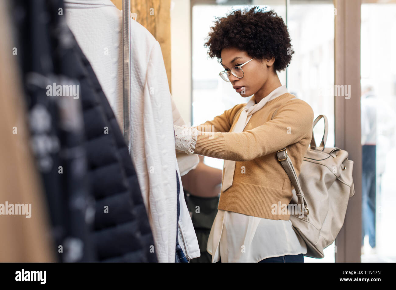 Retail standing searching concentration hi-res stock photography and ...