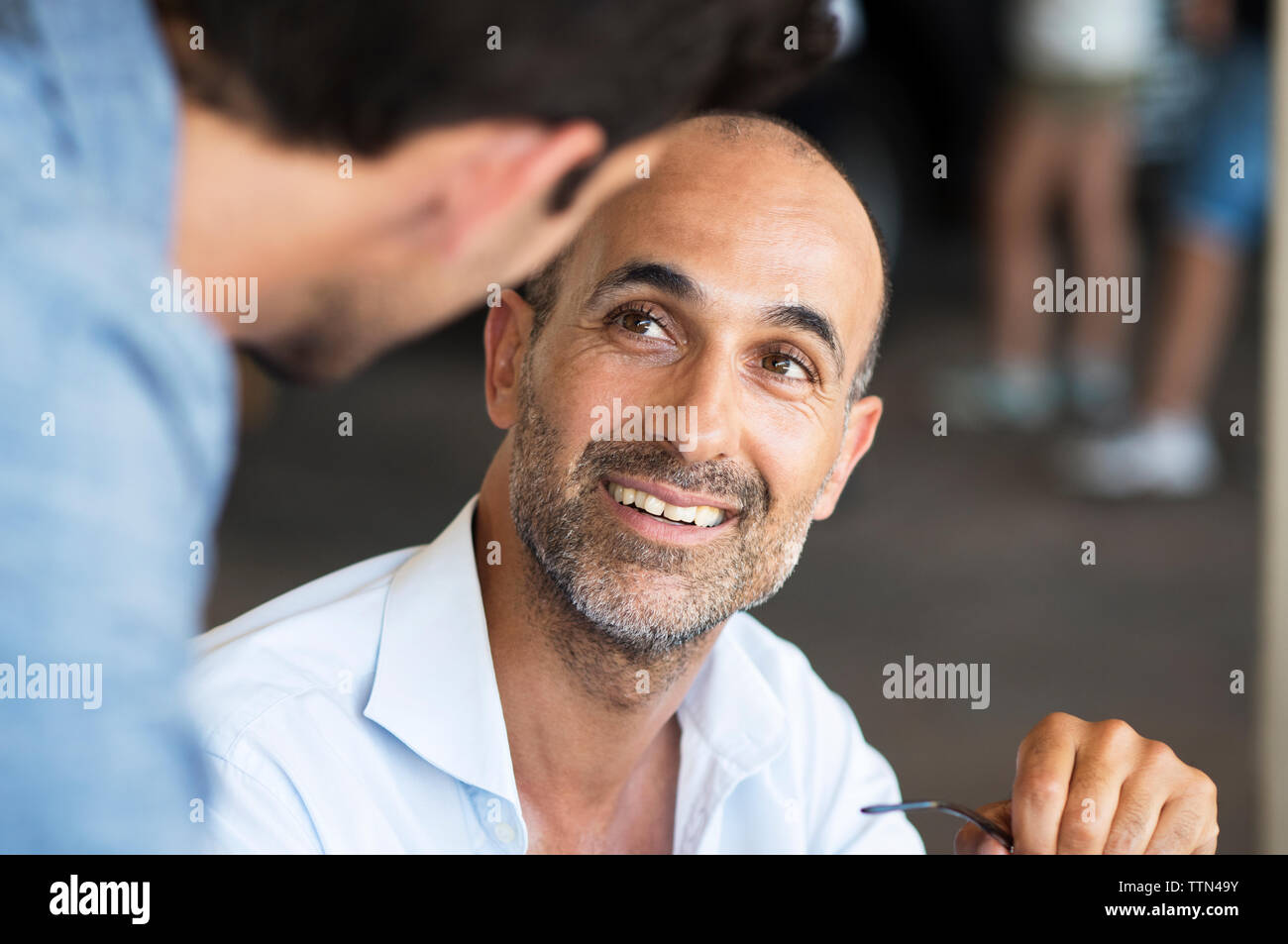 Two business people talking close up hi-res stock photography and ...