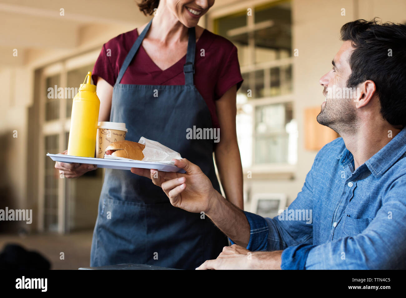 Woman hotdog hi-res stock photography and images - Alamy
