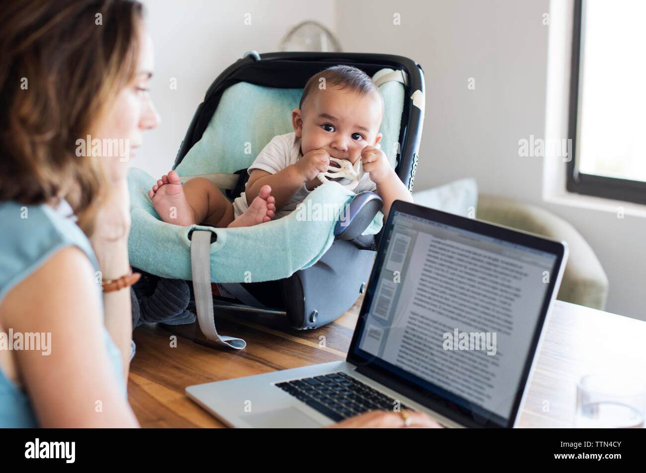 Baby table mother hi-res stock photography and images - Alamy
