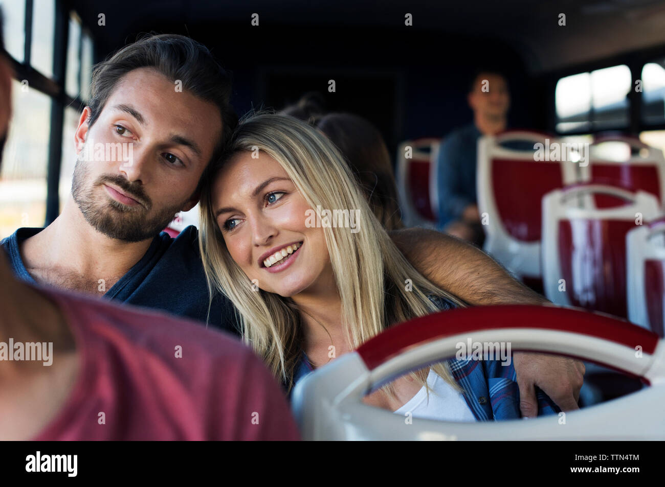 Tourists traveling in tour bus Stock Photo - Alamy