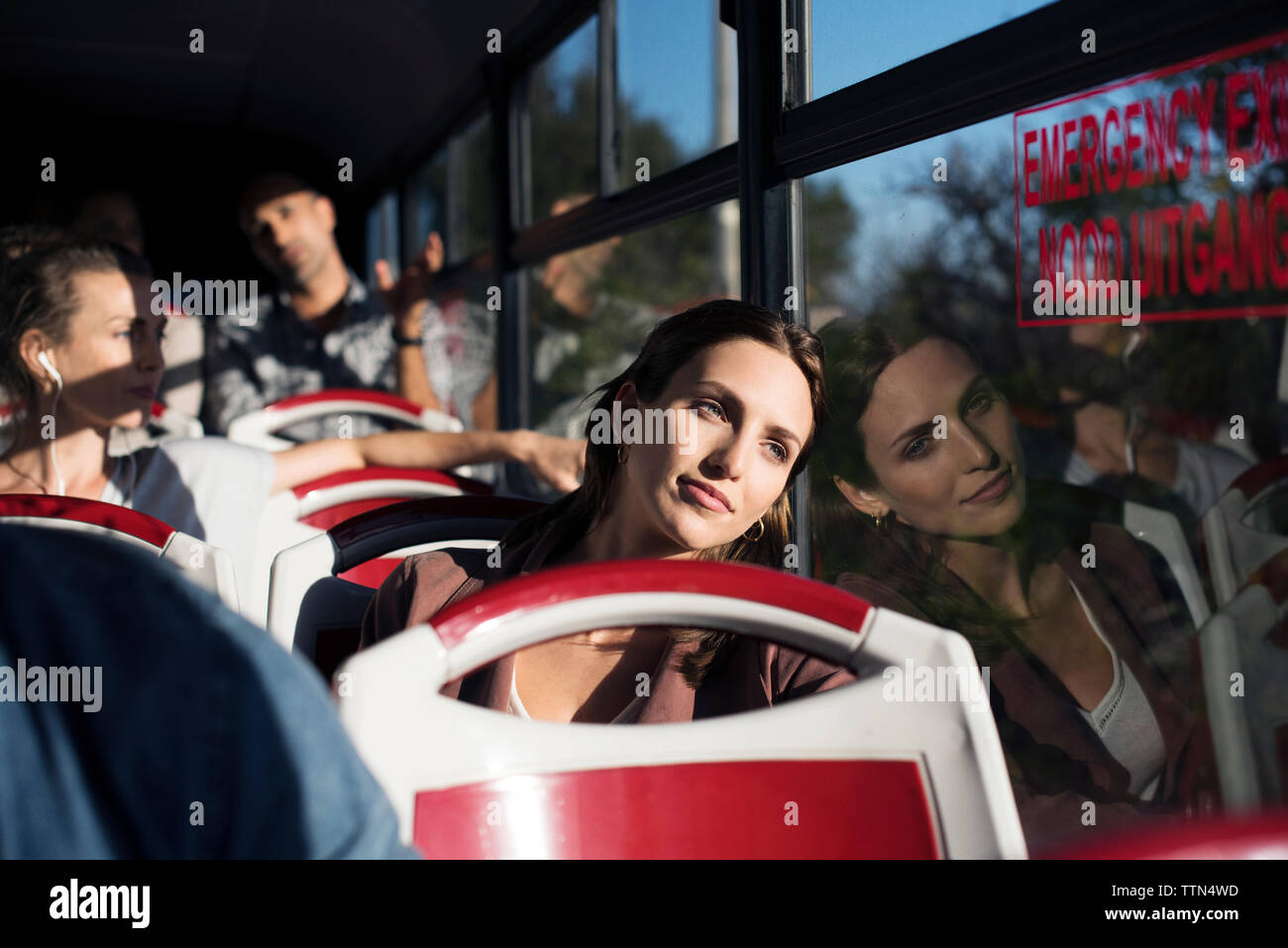 Man looking through bus window day hi-res stock photography and images ...