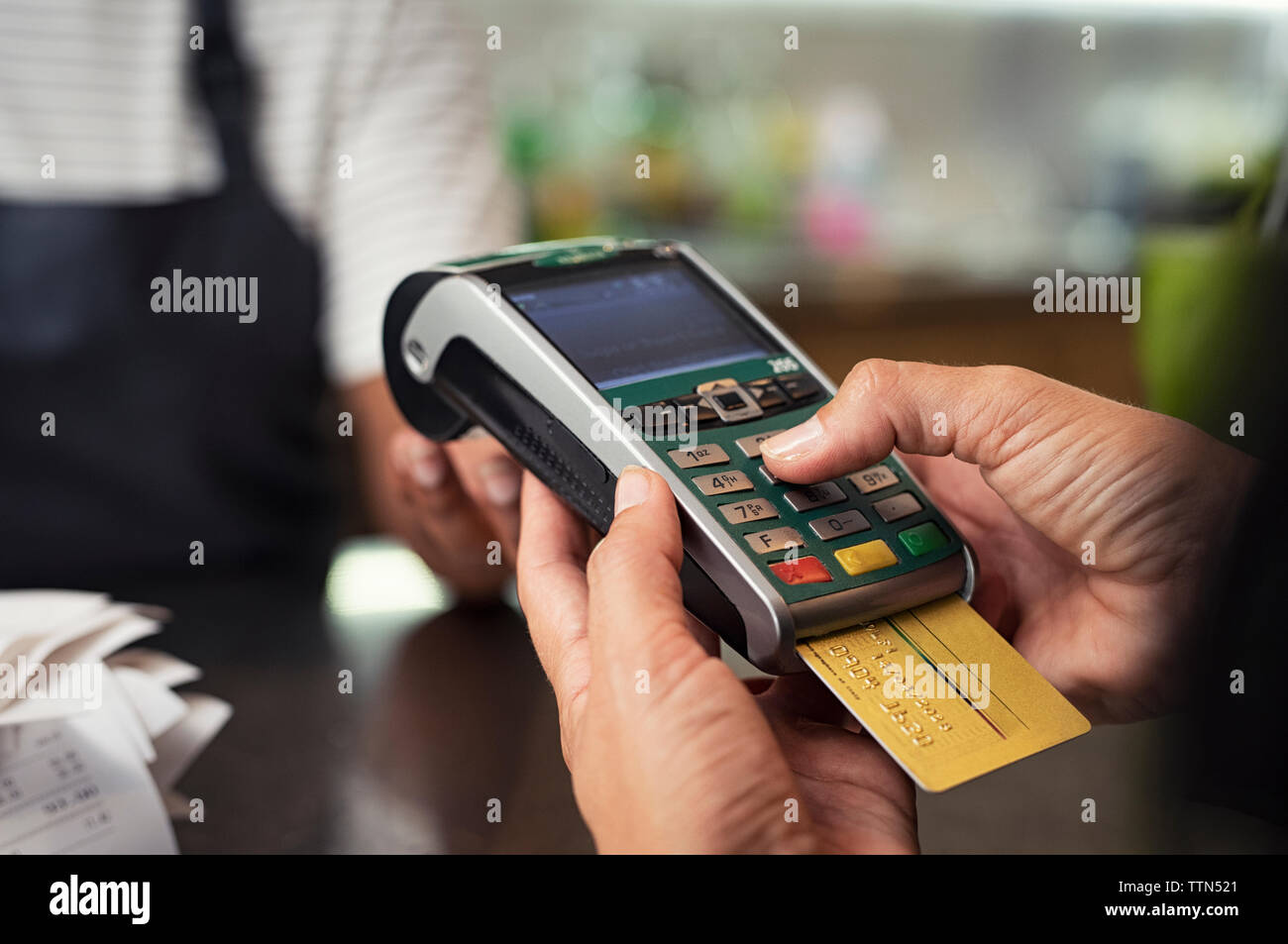 Payment at cashier hi-res stock photography and images - Alamy