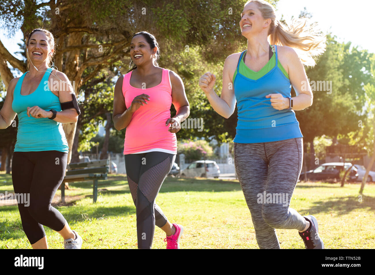Three Friends Jogging Together High Resolution Stock Photography and ...