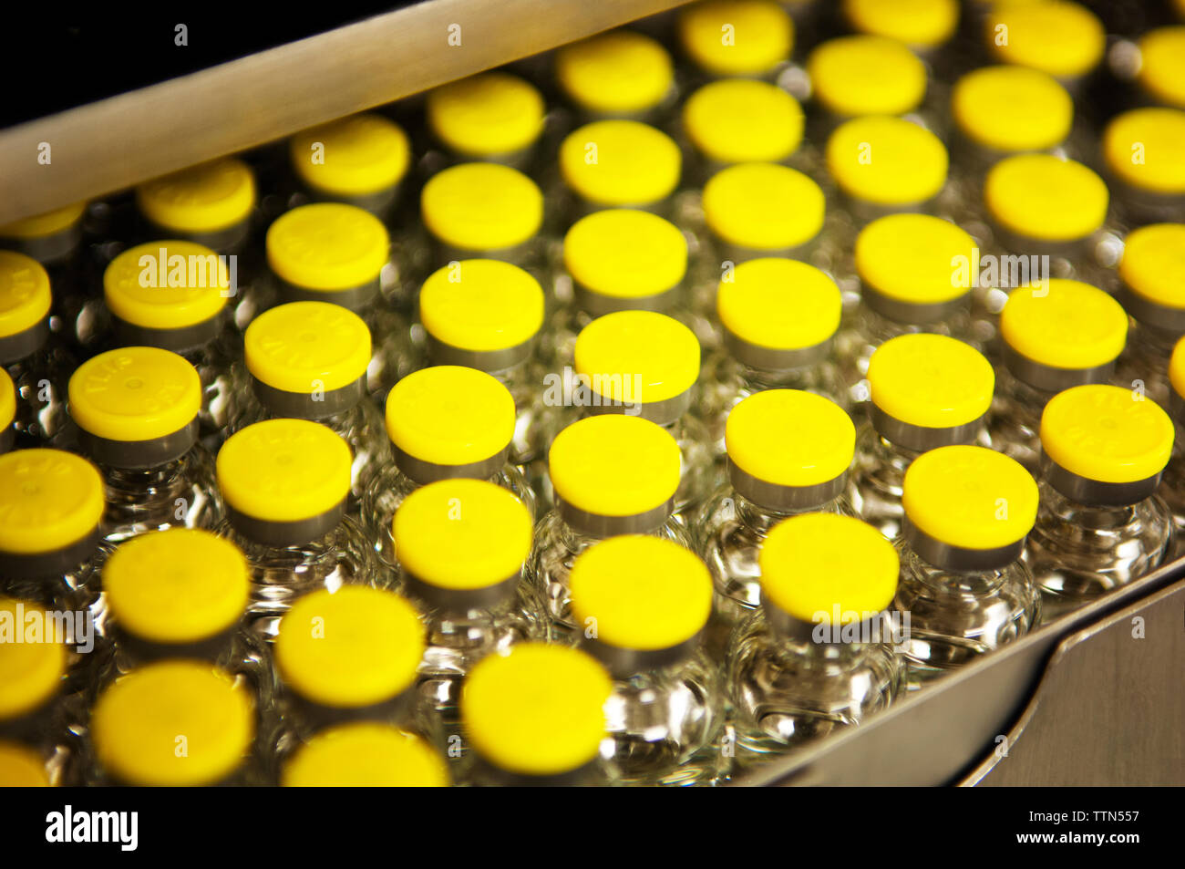High angle view of sample bottles at laboratory Stock Photo - Alamy