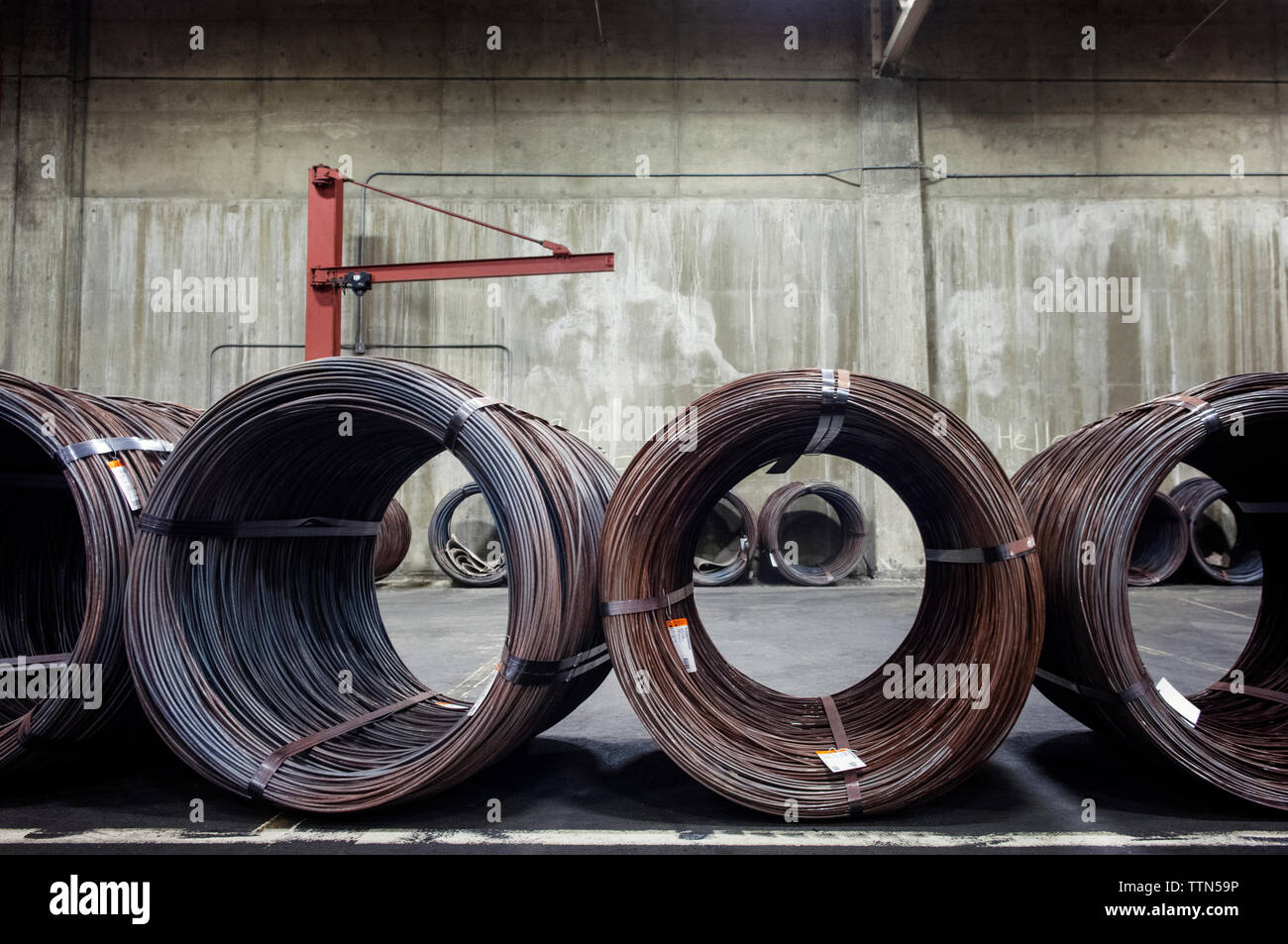 Rolled up steel wires at factory Stock Photo - Alamy