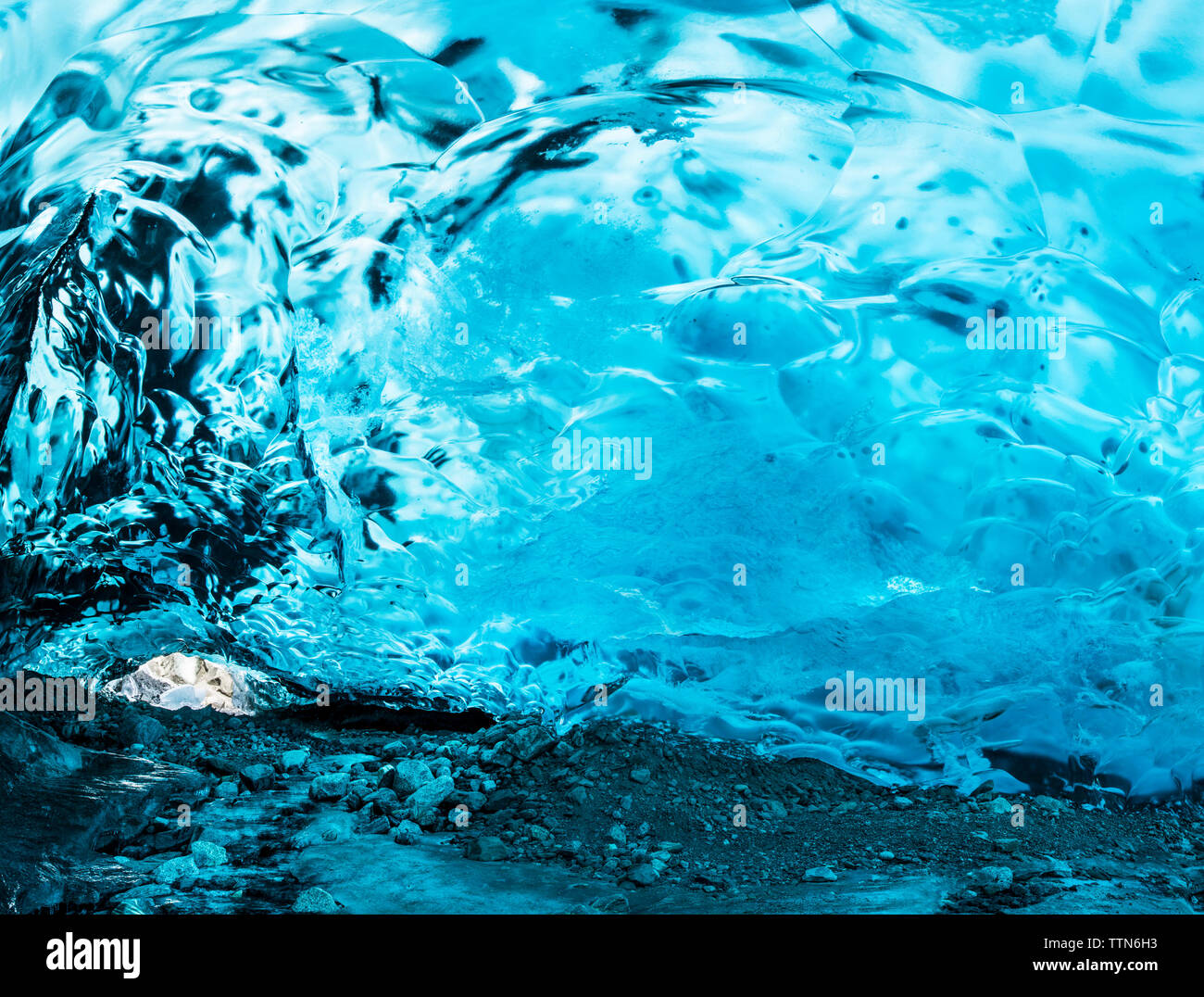 Idyllic view of Blue glacial ice cave at Mendenhall Glacier Stock Photo ...