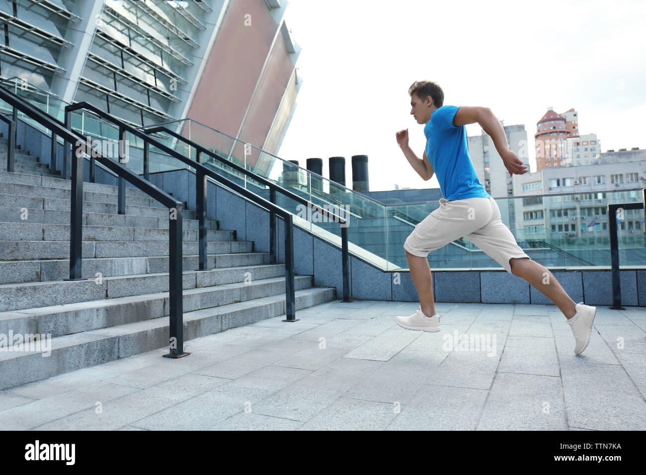 Man running stairs happy hi-res stock photography and images - Alamy