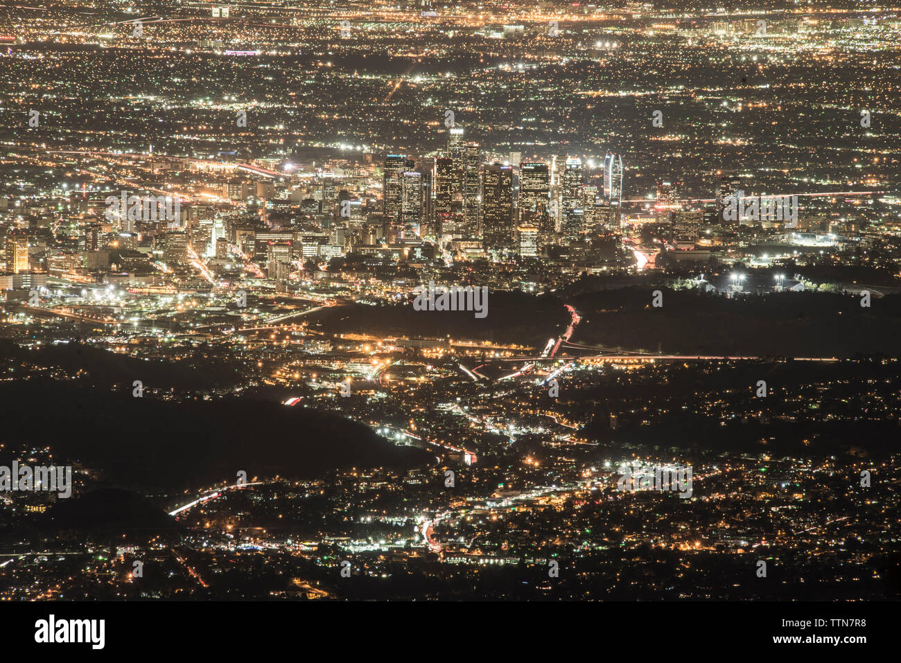 Aerial view of illuminated cityscape at night Stock Photo - Alamy