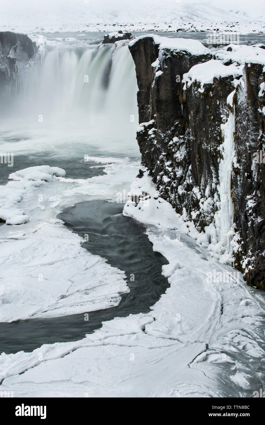 High angle scenic view of waterfall during winter Stock Photo - Alamy