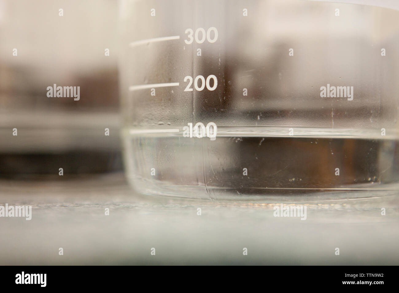 Close-up of measuring beaker Stock Photo - Alamy