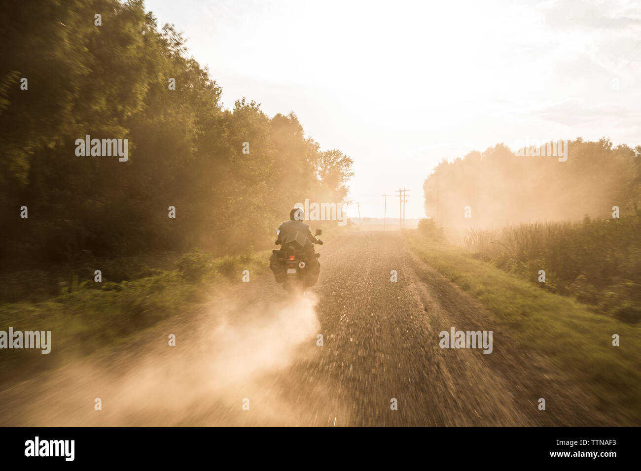 Rear view riding motorcycle hi-res stock photography and images - Alamy