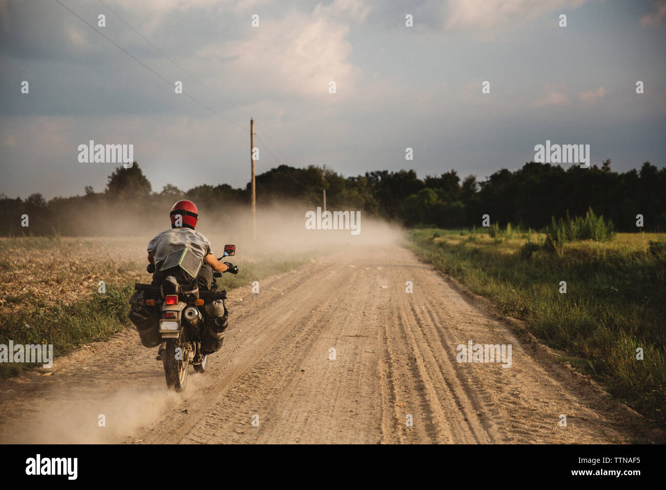 Rear view riding motorcycle hi-res stock photography and images - Alamy