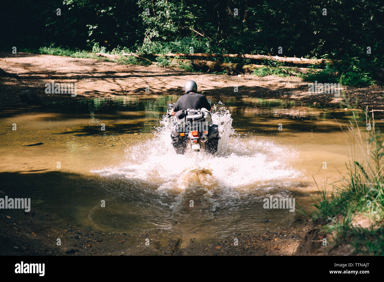 Rear view riding motorcycle hi-res stock photography and images - Alamy