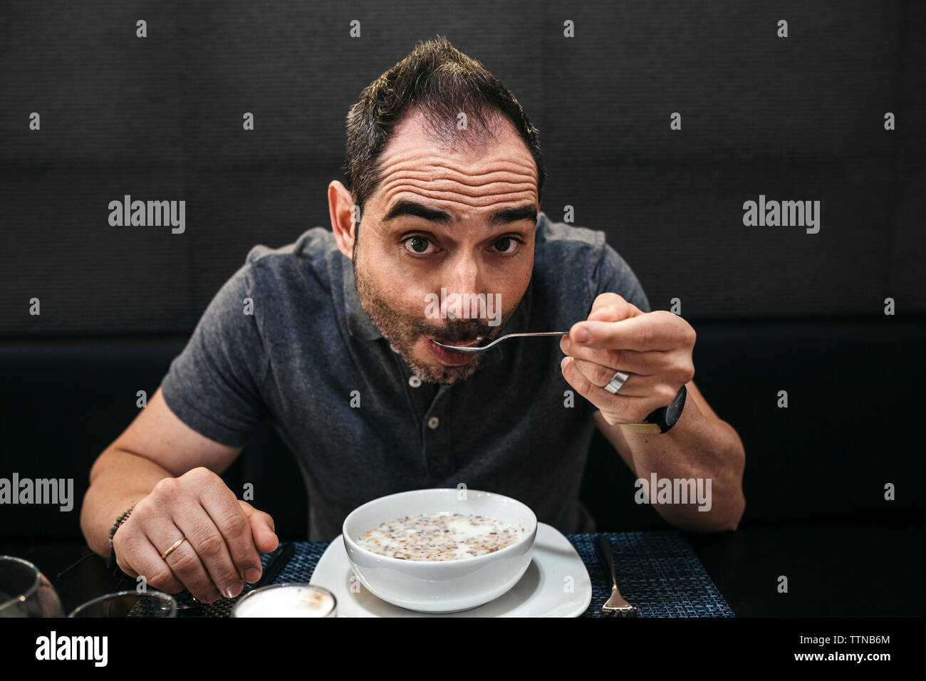 Mature man sitting restaurant hi-res stock photography and images - Alamy