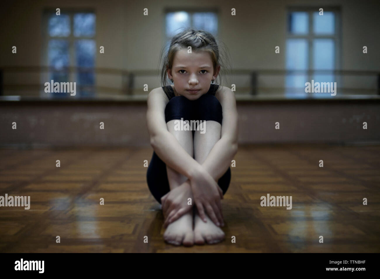 Girl sitting in studio hi-res stock photography and images - Alamy