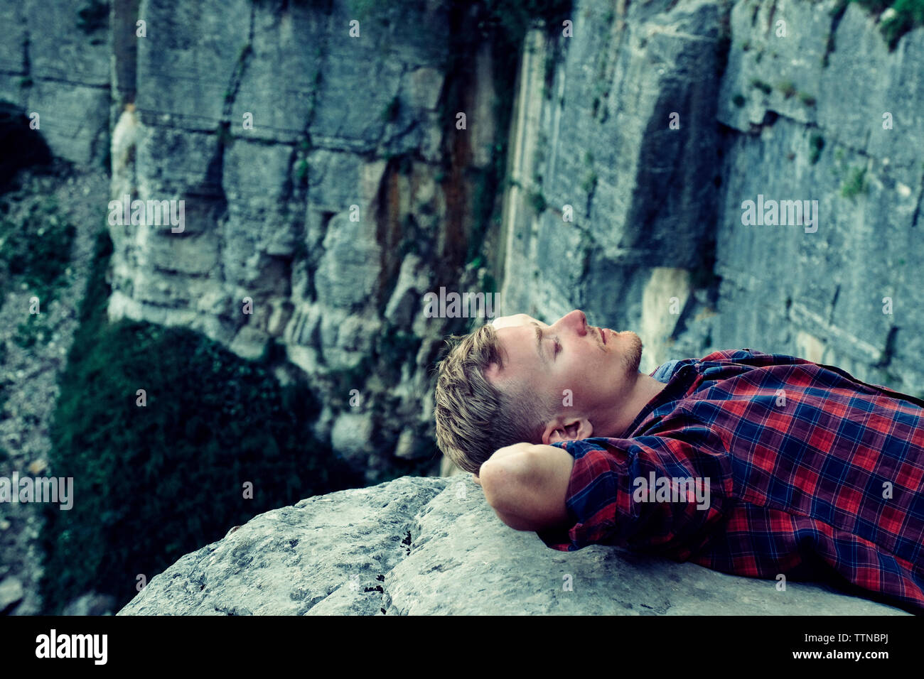 Adult Sleeping On Rock High Resolution Stock Photography and Images - Alamy