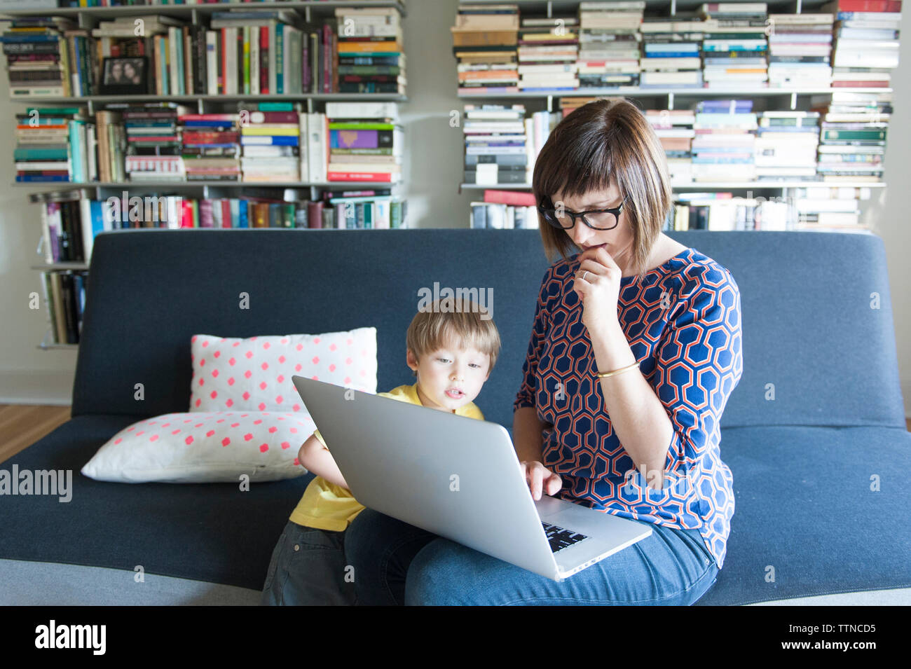 Female mother working home family technology hi-res stock photography ...