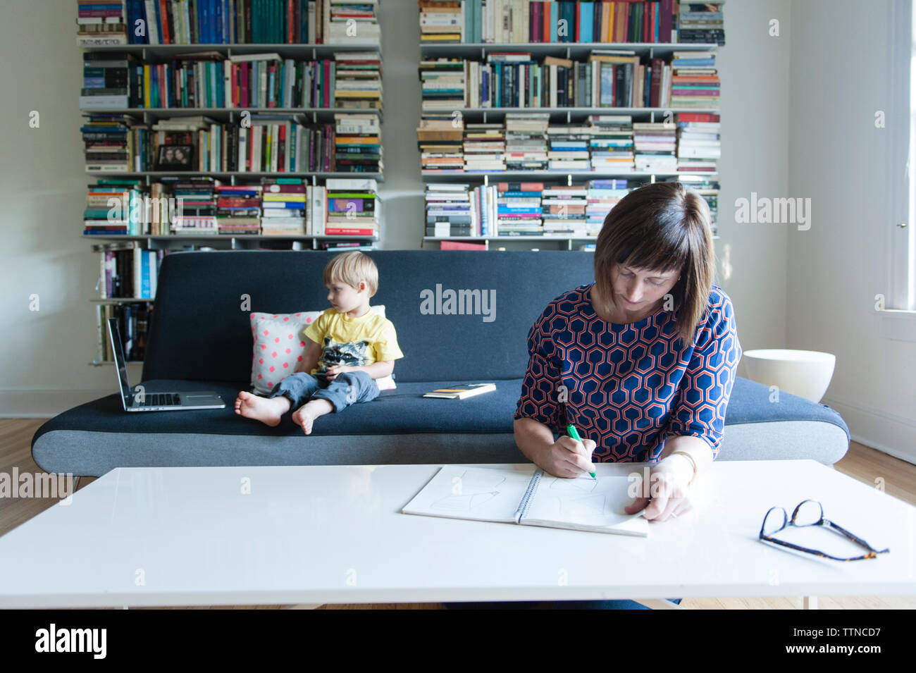 Family person writing hi-res stock photography and images - Alamy