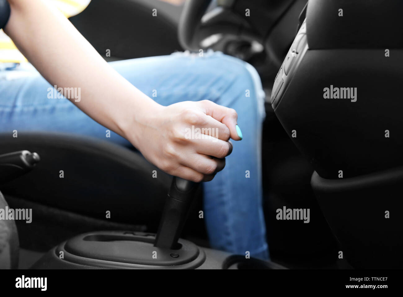 Woman shifting gears in hi-res stock photography and images - Alamy
