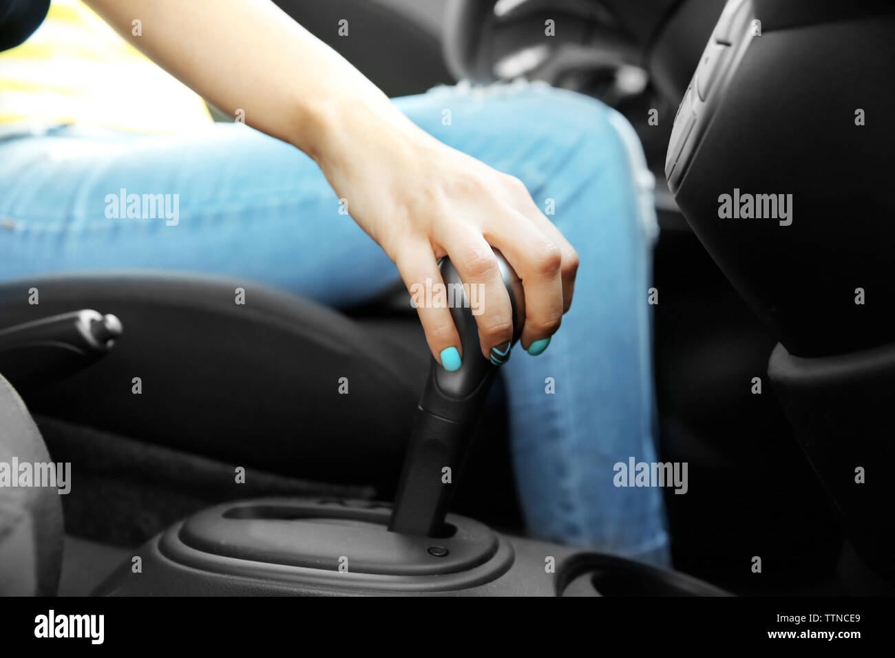 Woman shifting gears in hi-res stock photography and images - Alamy